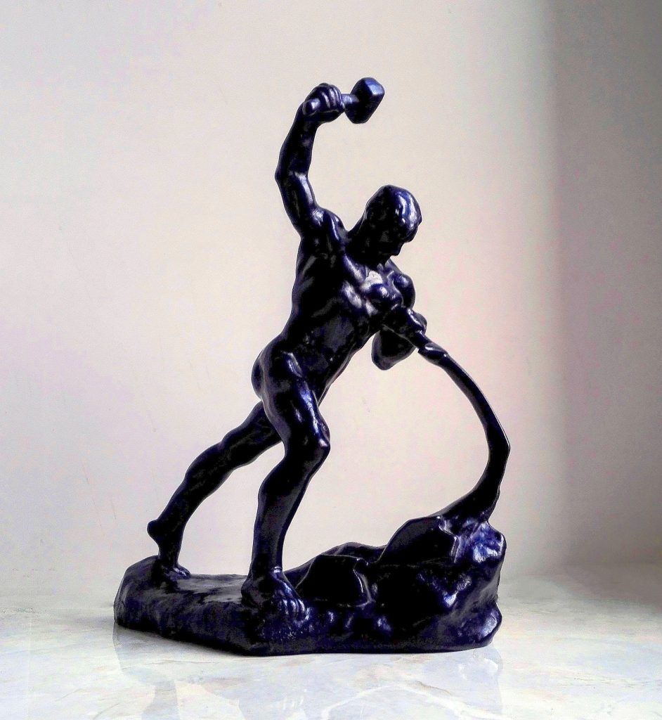 Antique Cast Iron Statuette Blacksmith. Cast iron figurine